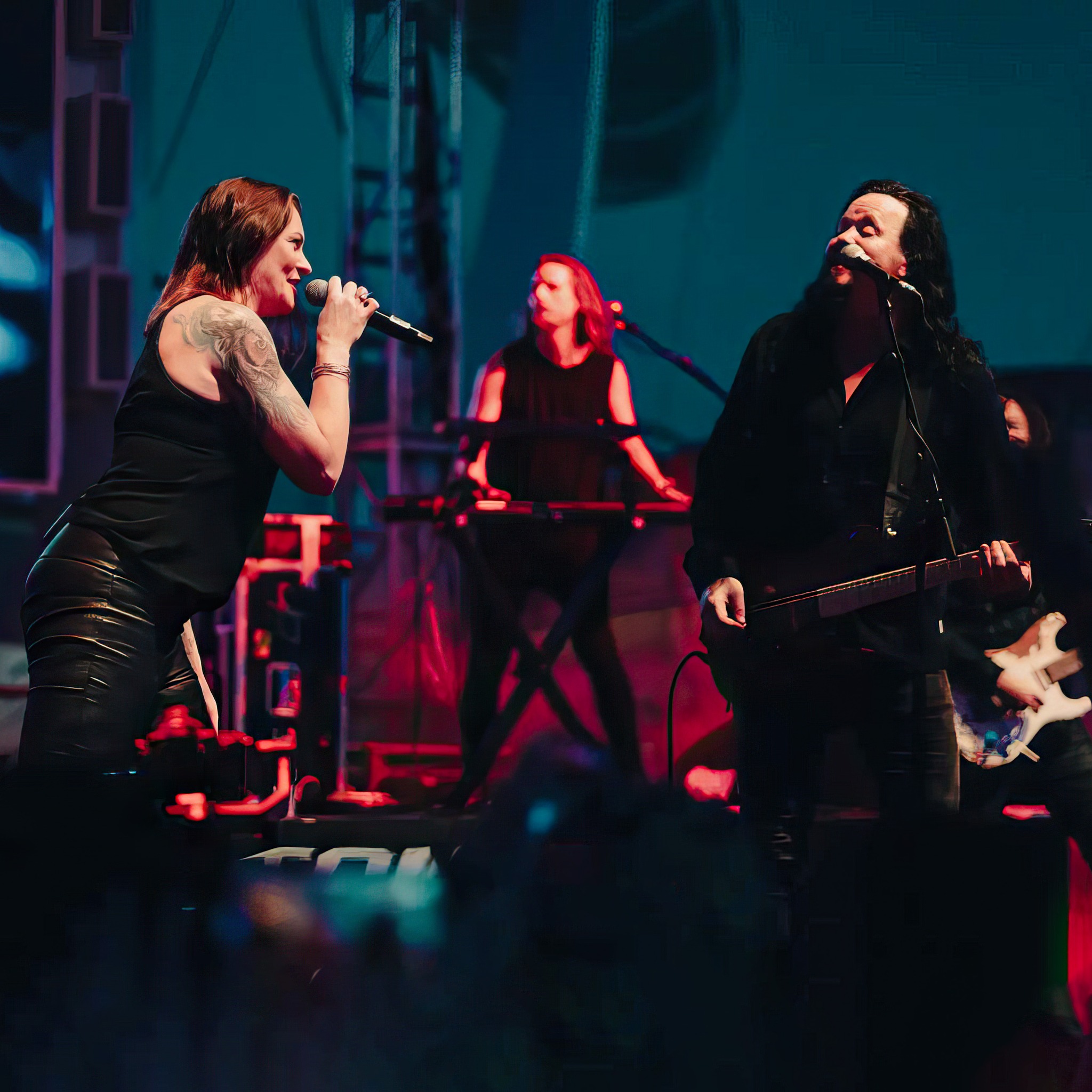Evergrey and Floor Jansen together on stage to perform "In Orbit" at ...